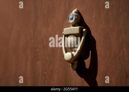 Unusual stylish door knocker in the shape of a robot Stock Photo - Alamy