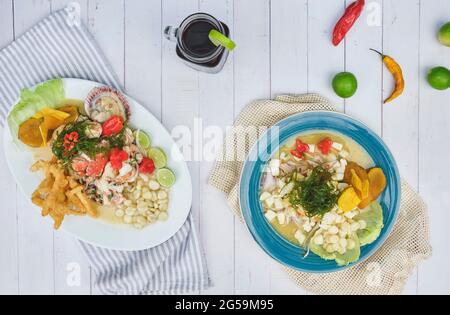 Typical Peruvian food, squid ceviche, shrimp and white fish with purple ...