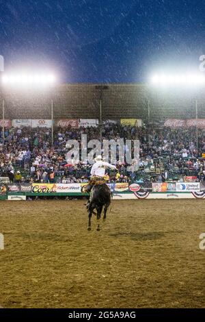 Riggin Smith rides during the saddle bronc competition. Day 8 of the ...
