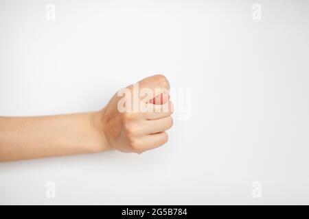 The female hand shows the fig sign. Denial Stock Photo - Alamy