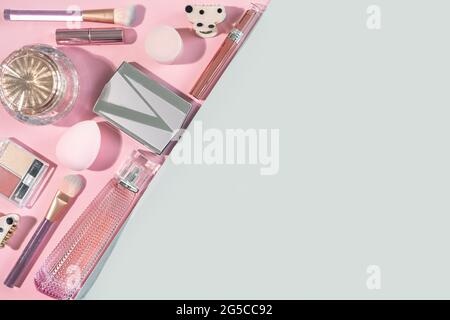 Flat lay composition with pink cosmetic bag with cosmetic makeup ...