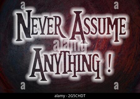 Never Assume Anything Concept text on background Stock Photo - Alamy