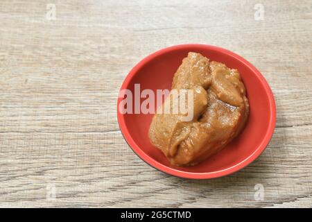 jaggery palm sugar in cup with silver spoon on table Stock Photo - Alamy