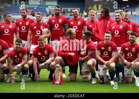 British and Irish Lions players pose with the trophy after The Vodafone ...
