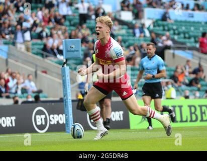Harlequins' Louis Lynagh celebrates after scoring a try during the ...