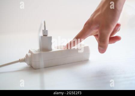 caution, hand insert the finger into the electricity socket, danger and ...