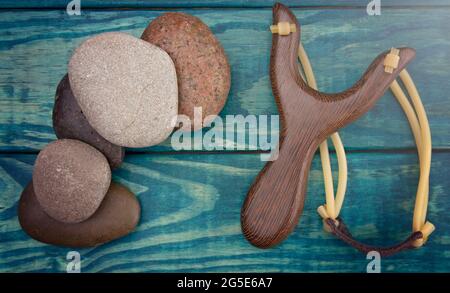 Five Smooth Stones and a Sling Shot on a Hebrew Scroll Symbolising the ...