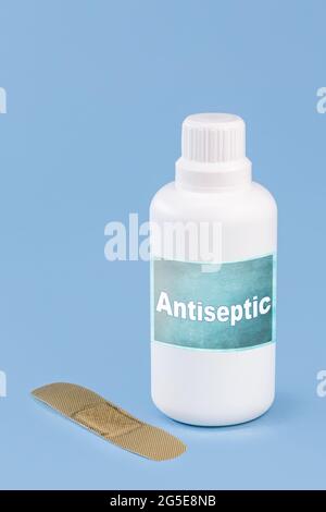plastic container, bottle written in English: antiseptic, solid blue ...