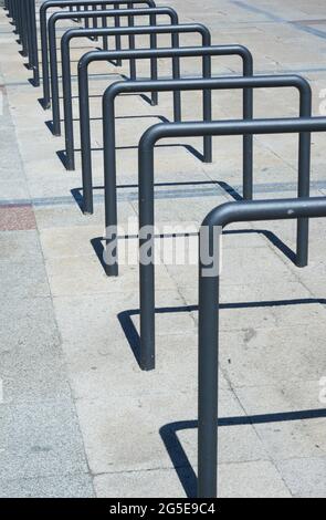 metal bars for parking bicycle in a city Stock Photo - Alamy