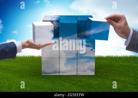 Businessman building cloud cube with the shapes Stock Photo - Alamy
