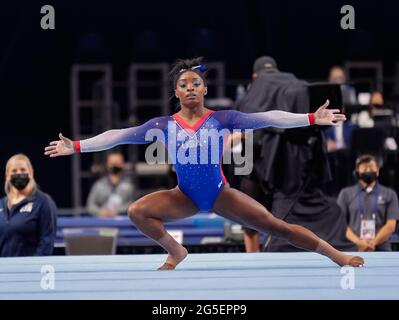 June 25, 2021: Simone Biles twists in the air during her floor routine ...