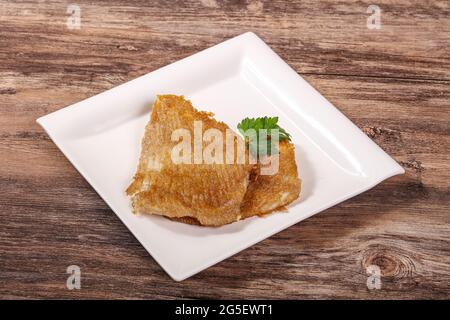 Roasted delicous seafood - stingray fish wings Stock Photo - Alamy