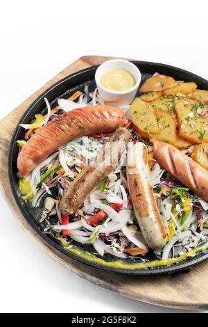 mixed german traditional organic sausage and potato meal platter ...