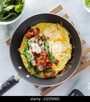 Ingredients to prepare bacon and cheese egg muffin Stock Photo - Alamy