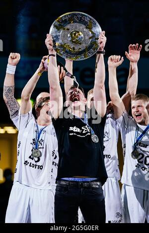 Players of the Rhein-Neckar Löwen, celebration after the final whistle ...
