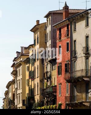VERONA, ITALY - MAY 5 2018 : Houses near Erbe square Stock Photo - Alamy