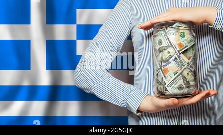 Dollars on flag of Greece, Greek finance, subsidies, social support ...