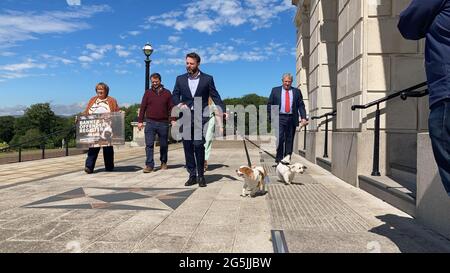 SDLP MLA Dolores Kelly (left) embraces DUP MLAs Joanne Bunting (right ...