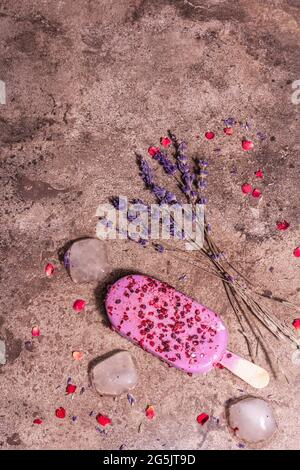 Lavender ice cream. Flower bouquet, pink rose petals. Trendy hard light ...