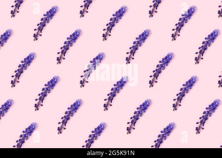 Repetitive pattern made from pink star foil balloon. Creative layout ...