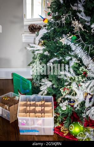 Messy living room interior with Christmas tree. Chaos after party Stock ...