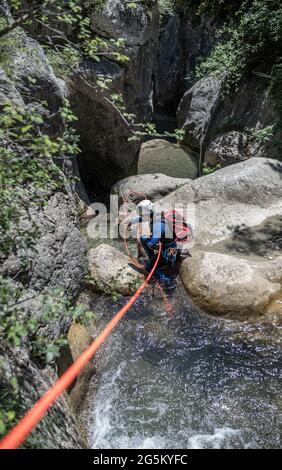 4 years old boy pulling rope Stock Photo - Alamy