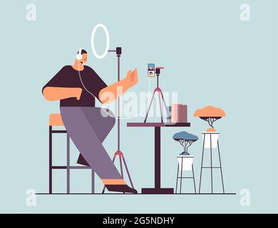 podcaster talking to microphone recording podcast in studio podcasting ...