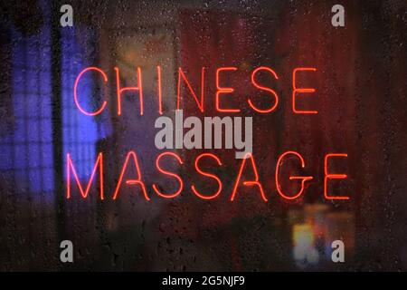 Vintage Neon Sign in Window Asian Massage Stock Photo - Alamy