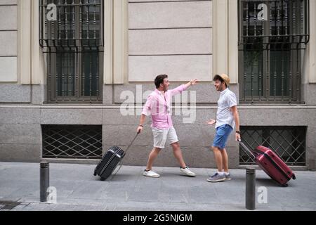 A couple of tourist happy and surprised when then re-encounter after ...