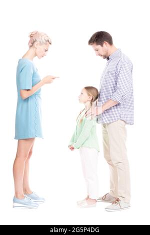 Father and mother telling off their daughter for disobedience Stock ...