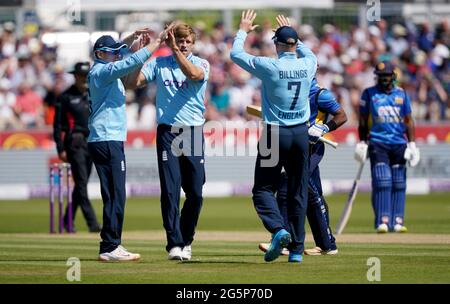 Sri Lanka's Charith Asalanka, left, watches his shot during the third ...