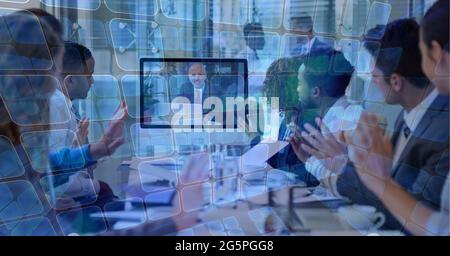 Composition of network of digital screens over people clapping in ...