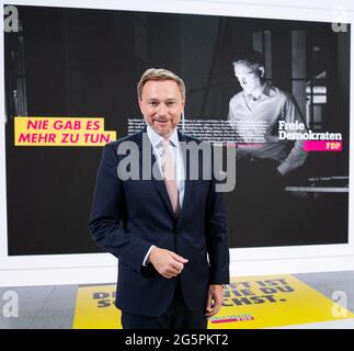 Berlin, Germany. 29th June, 2021. An oversized bow in rainbow colours ...