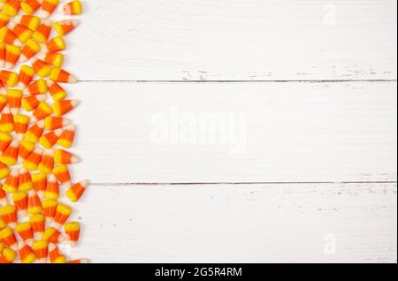 Candy corn frame over a wooden surface great for writing text Stock ...