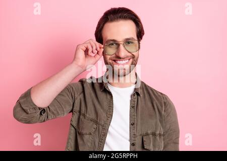 Photo of charming pretty man wear jeans shirt walking looking empty ...
