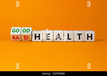 Good or bad health symbol. Turned wooden cubes and changed concept ...