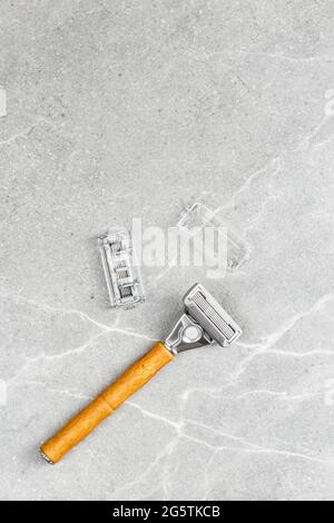 Shaving blade, macro, on a wooden table Stock Photo - Alamy