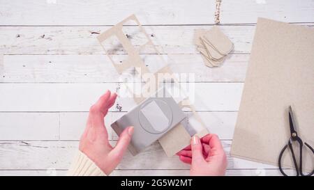 Flat lay. Step by step. Cutting out snowflakes with cookie cutters out ...