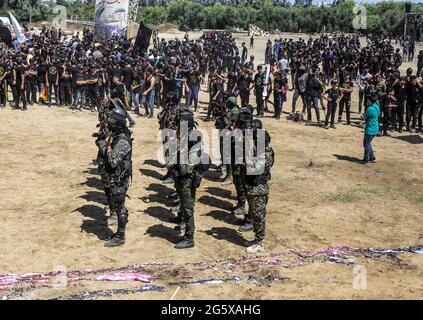 Islamic Jihad militants salute during a graduation ceremony for young ...