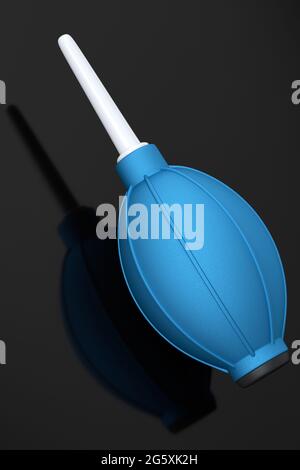 Hand air blower bulb for camera isolated on black background. 3D ...