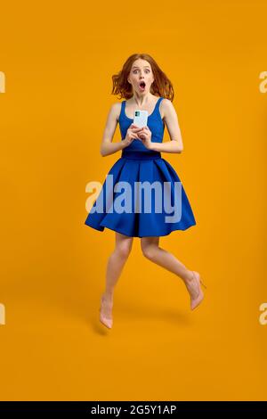 Photo of excited pretty lady wear off shoulders top pointing fingers ...