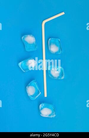 ice cubes on blue background Stock Photo - Alamy