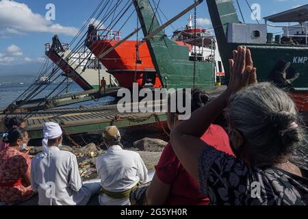 Jembrana, Bali, Indonesia. 30th June, 2021. Family and relatives from ...