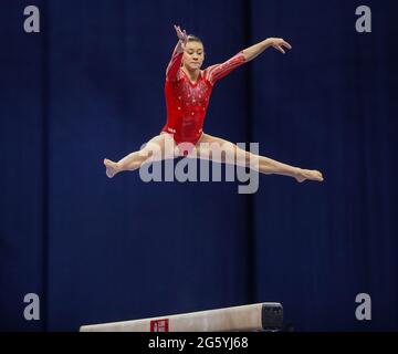 June 25, 2021: Leanne Wong transitions between the bars during Day 1 of ...
