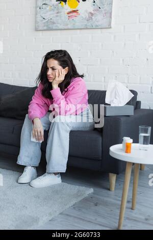 Woman holding napkin near face health problems runny nose flu Stock ...