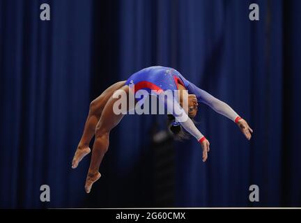 June 25, 2021: Simone Biles flies through the air during her floor routine during Day 1 of the ...