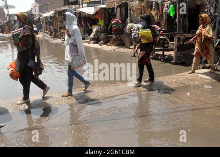 Inundated road by overflowing sewerage water, creating problems for ...