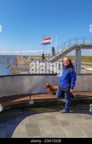 IJsselmeer in the Netherlands. April 17, 2021. Cars parked in ...