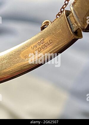 rolled gold hallmark stamp on bracelet 1/5 9ct gold Stock Photo - Alamy