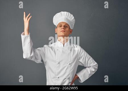 emotional chef gestures with his hand to a professional foodie Stock ...